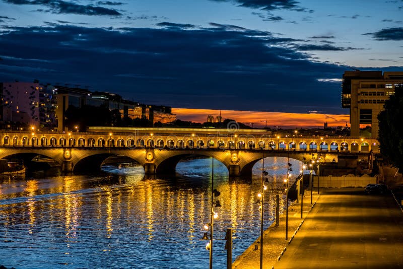 Pont De Bercy with Metro in Paris during Blue Hour in Summer Stock ...