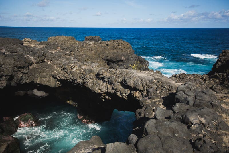 Pont Naturel. Mauritius. the Indian Ocean and the Cliffs. Stock Image ...