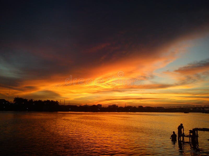Pontianak human sunset stock image. Image of shore, horizon - 298625637