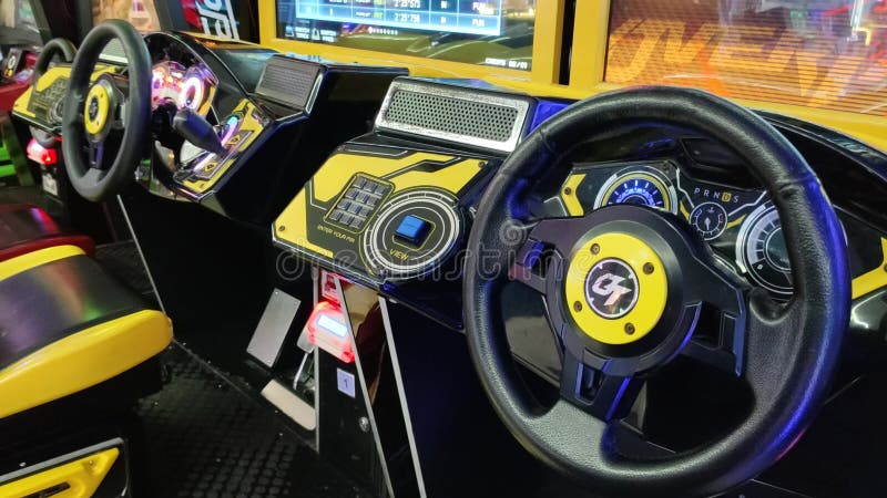 Colorful Arcade Racing Game Setup with Virtual Dashboard and Steering ...