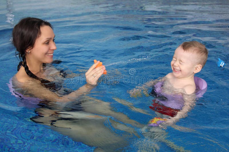 Pool stock image. Image of playful, female, family, caucasian - 12419355