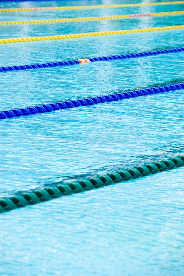 Indoor Swimming Pool Lanes stock photo. Image of flags - 11859384