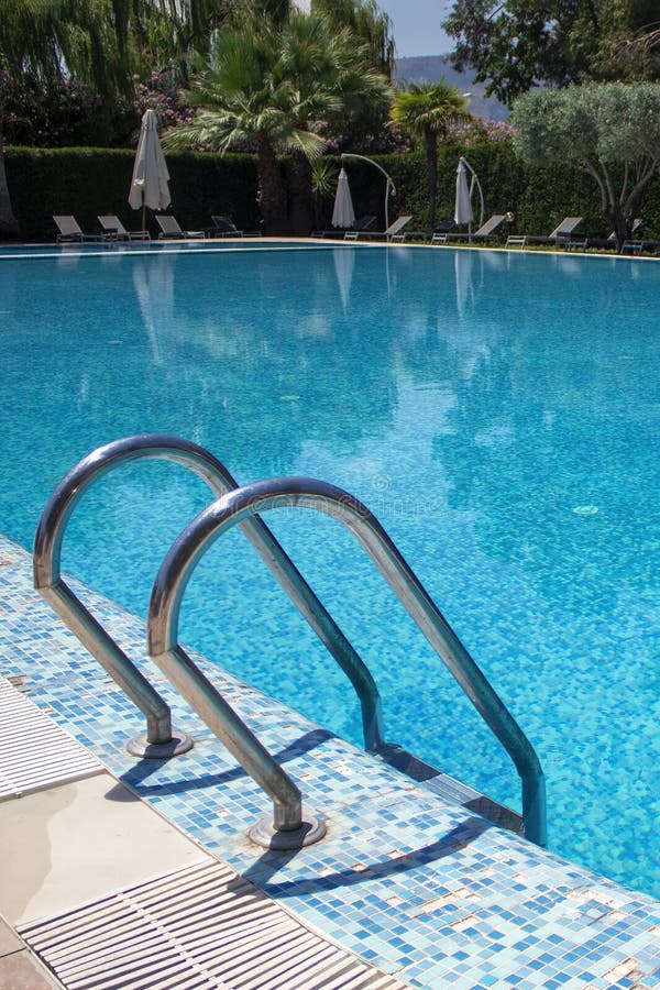 Pool Area. Swimming Pool with Palm Trees Stock Photo - Image of beach ...