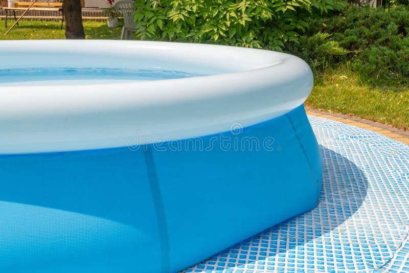 A Round, Blue, Garden Pool for Children. Stock Photo - Image of yard ...