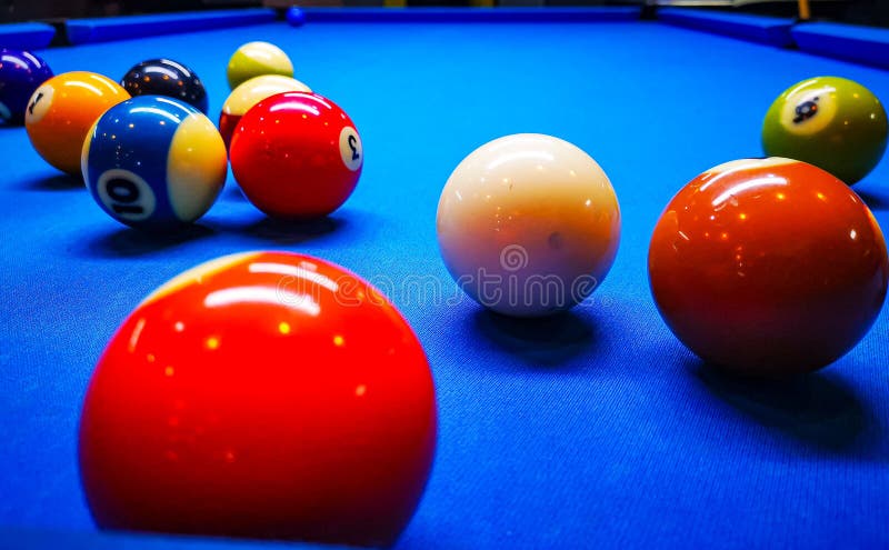Pool Balls on a Blue Pool Table in Ongoing Game. Vivid Colors Stock ...