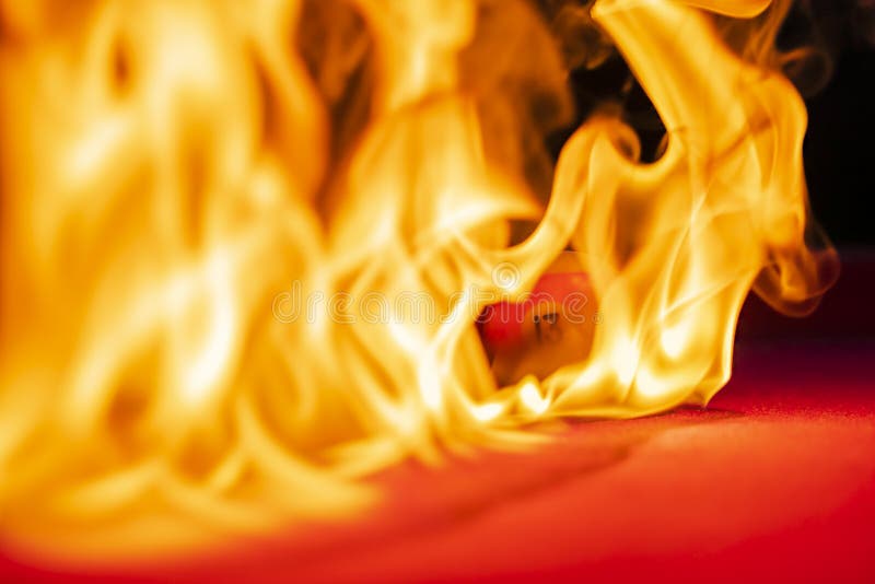 Pool Balls are Lit on Fire while Sitting on a Pool Table in an Outdoor ...