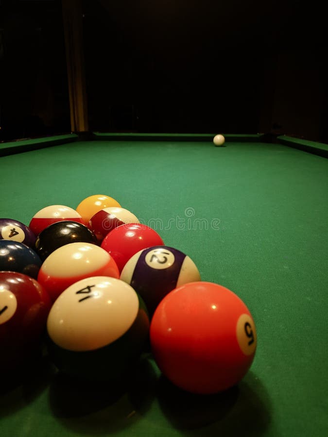 Pool balls on a pool table stock image. Image of racked - 137556717
