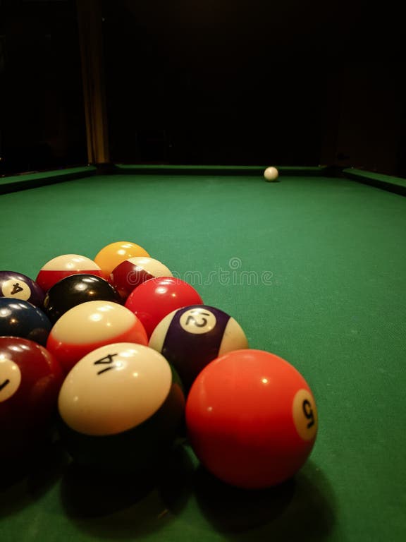 Pool balls on a pool table stock image. Image of racked - 137556717
