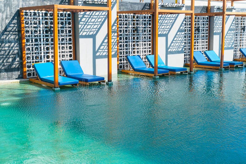 Pool Bed Around Swimming Pool Stock Photo - Image of palm, sunrise ...