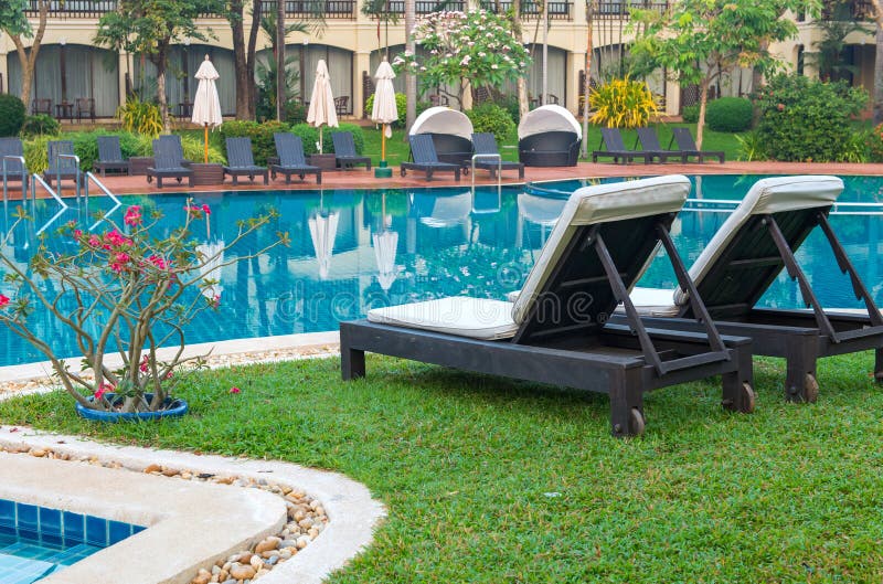 Pool Bed Near Swimming Pool in Tropical Resort Stock Image - Image of ...