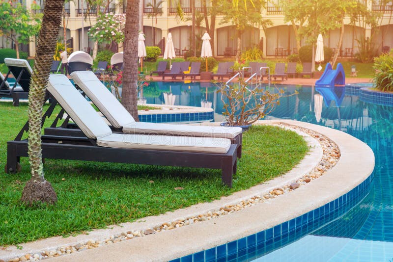 Pool Bed Near Swimming Pool in Tropical Resort Stock Photo - Image of ...
