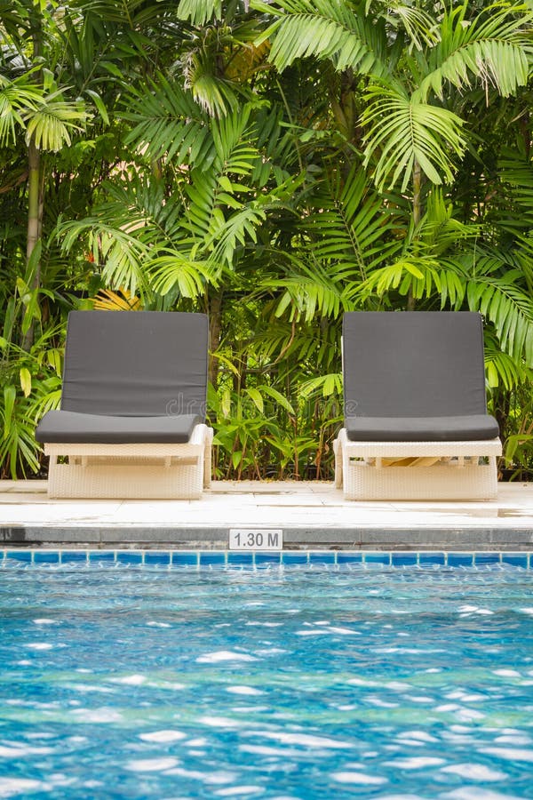 Pool bed stock image. Image of luxury, umbrella, garden - 34652839