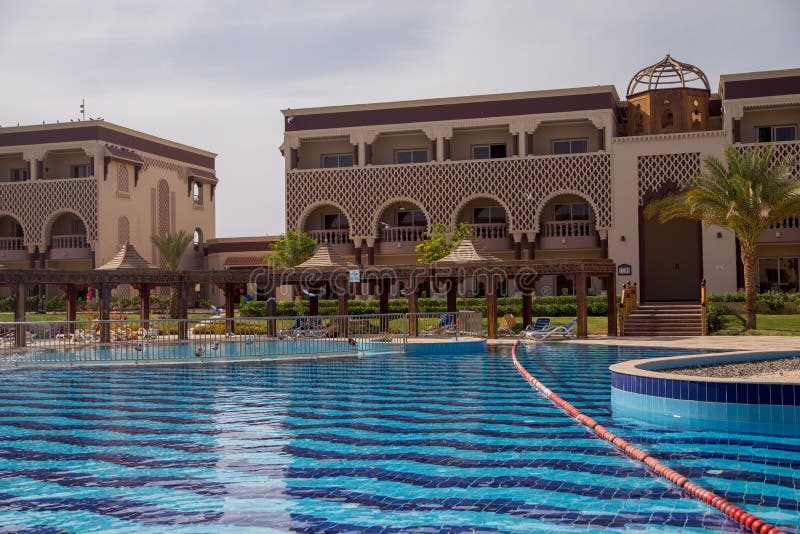 Pool with Blue Water in an Arab Hotel Stock Photo - Image of hotel ...