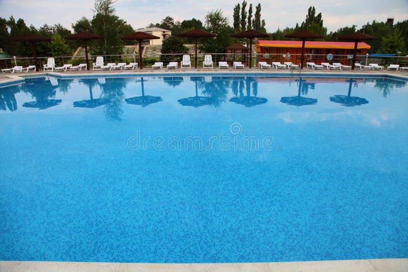 Pool with blue water stock photo. Image of reflection - 45004126