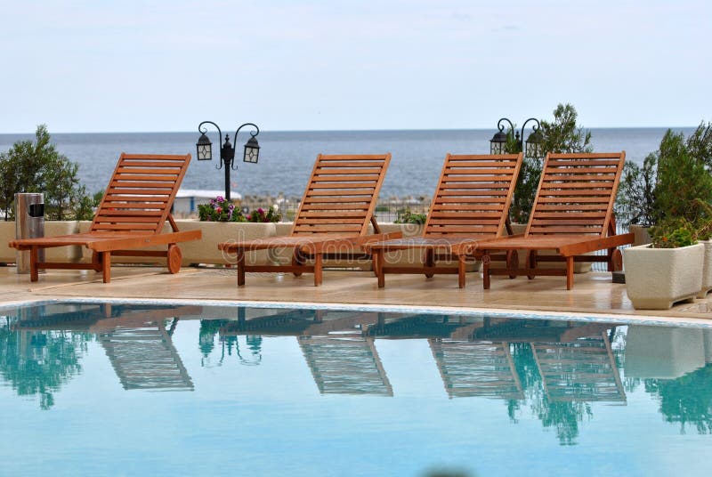 Pool chairs stock photo. Image of clear, chair, reflection - 15962884