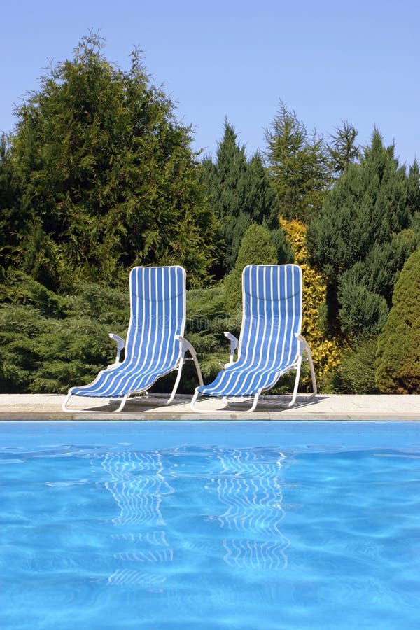 Pool chairs stock image. Image of relaxation, cosy, blue - 6014545