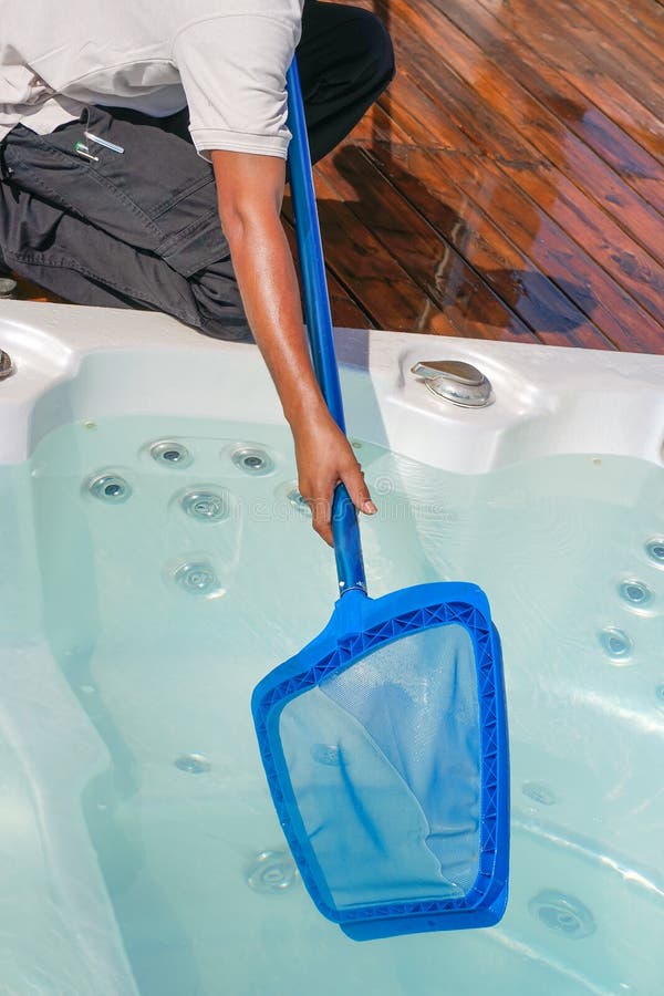 African Hotel Staff Worker Cleaning the Jacuzzi. Maintenance Stock ...