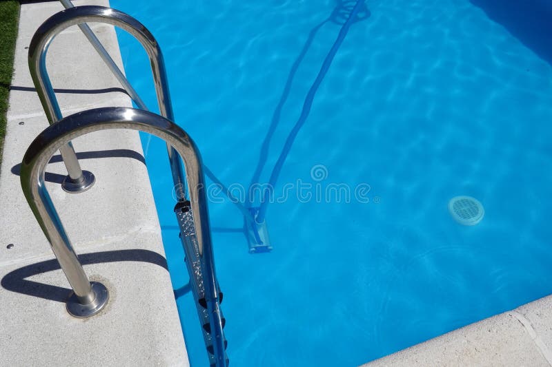 Pool Cleaner by the Side of a Swimming Pool. Cleaning Private Pool ...
