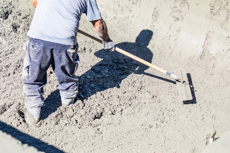 Pool Construction Worker Working with a Bullfloat on Wet Concrete Stock ...