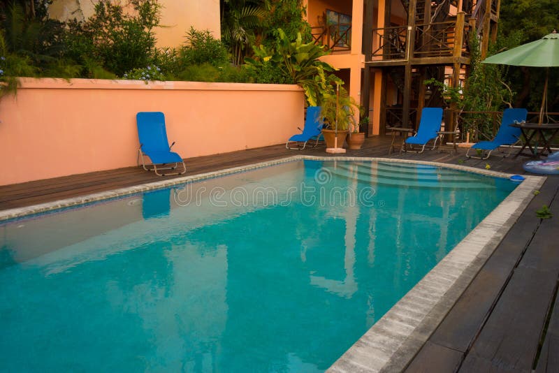 A Pool Deck in the Caribbean Stock Image - Image of caribbean, foliage ...