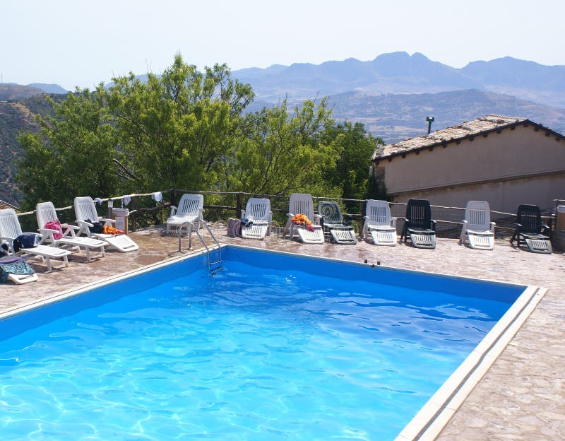 Pool deck in countryside stock photo. Image of large - 10350186