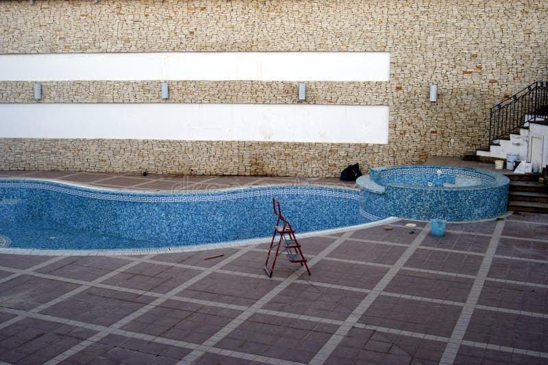 Pool deck work in progress stock image. Image of deck - 79438309