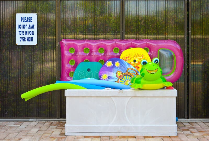 Pool Floats in Container stock image. Image of water - 110034051