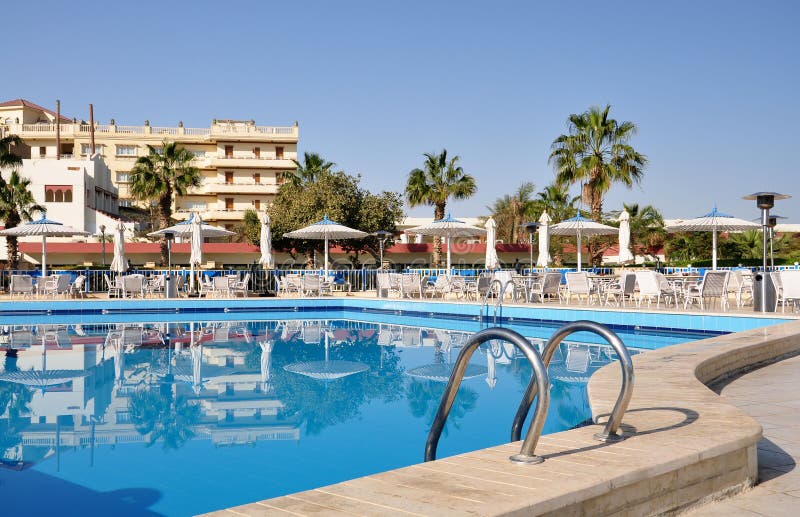 Pool in Front of the Hotel. Stock Image - Image of leisure, chair: 18898417