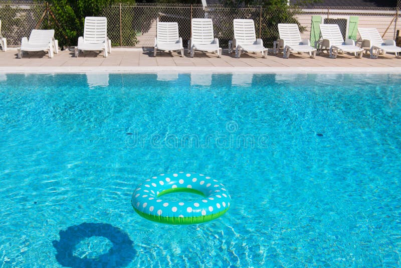 Pool with Inflatable Blue Ring Stock Image - Image of pool, floating ...