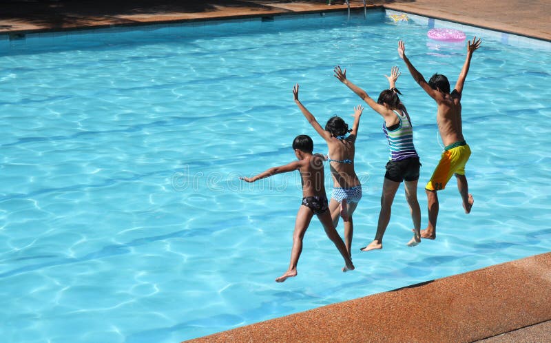 Pool jump stock photo. Image of tropical, friends, lifestyle - 13243304