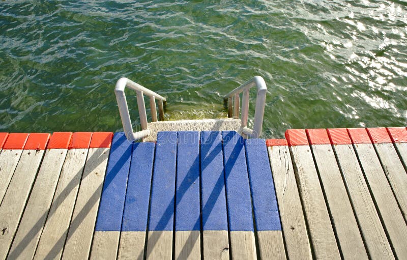 Pool Ladder with Blue Square and Red Stripes Stock Photo - Image of ...