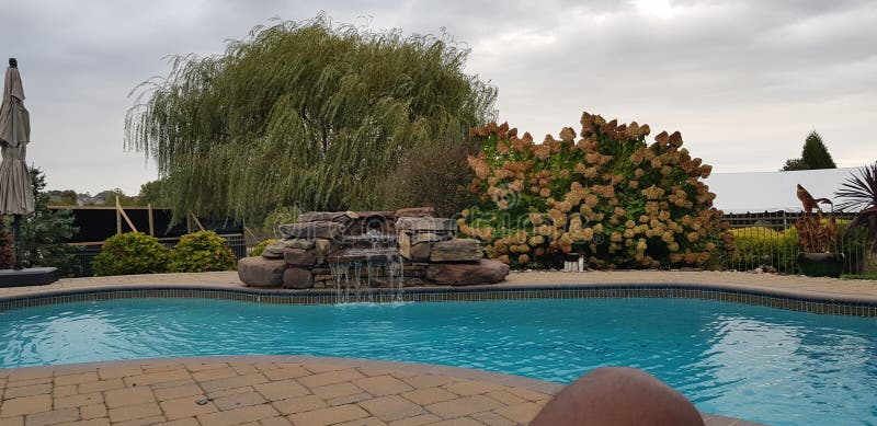 Pool life stock photo. Image of life, pool, waterfall - 162503998