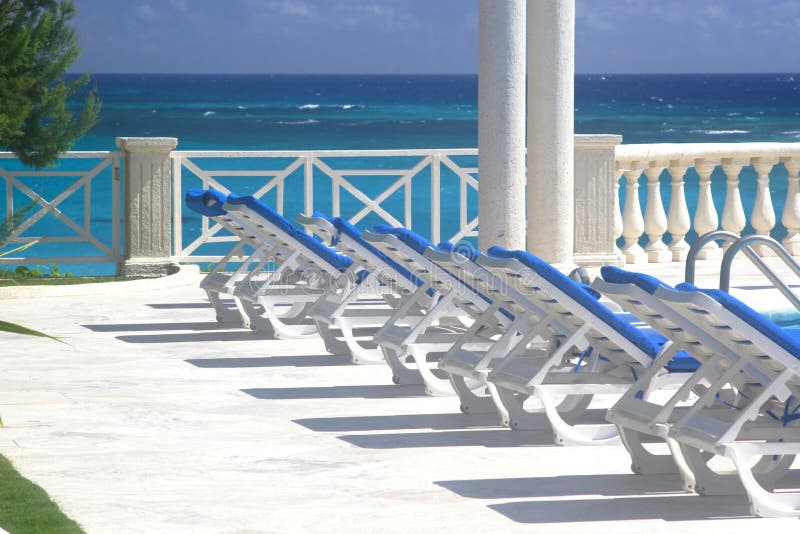Pool Lounge Chairs 2 stock image. Image of holiday, chair - 3659637