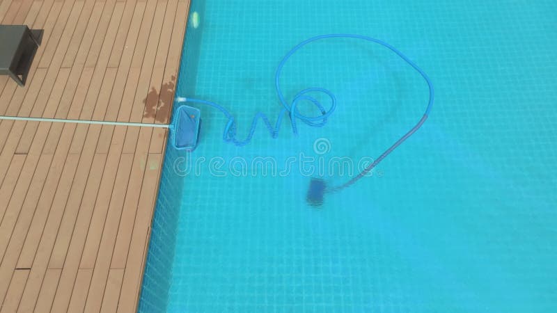 Pool Maintenance with Automatic Robot. Cleaner the Bottom of the Pool ...