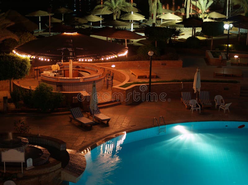 Pool by night stock photo. Image of seats, beach, relax - 1587634