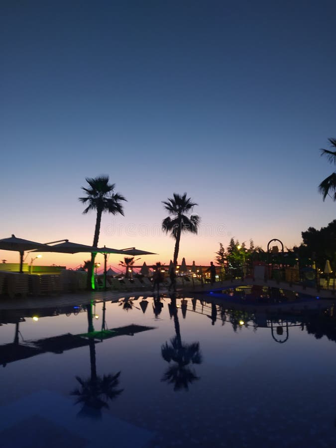 Pool at night stock photo. Image of colors, reflection - 221489694
