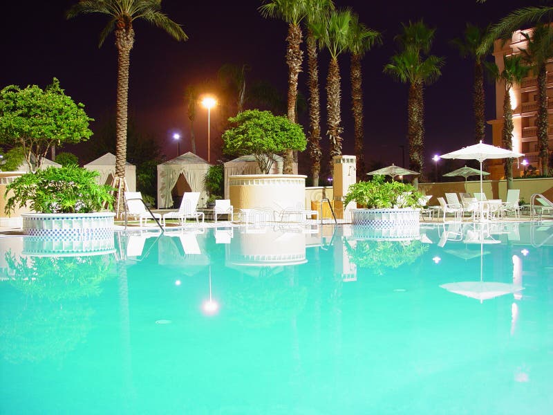 Pool by Night stock photo. Image of vacation, pool, sunbed - 411484