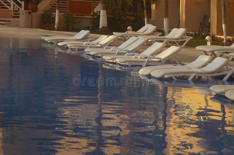 Pool place stock photo. Image of exotic, pool, palms, chairs - 83824