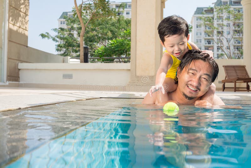 Pool play stock image. Image of parent, bonding, pool - 39613795
