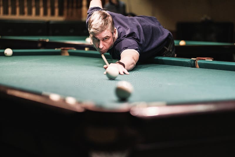A Pool Player Takes Aim at the Ball Stock Image - Image of looking ...