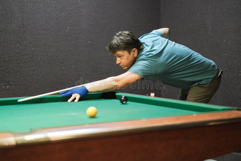 A Pool Player Takes Aim at the Ball Stock Image - Image of seven, face ...
