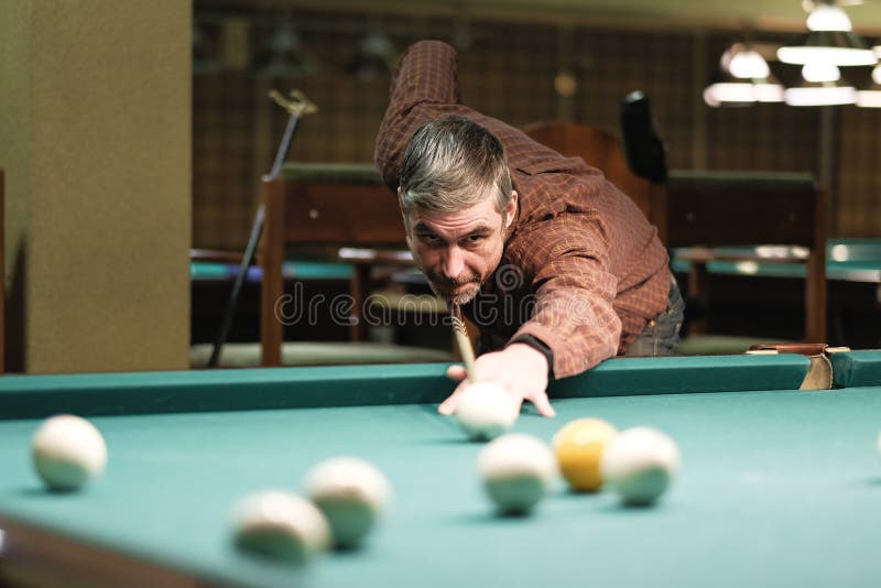 A Pool Player Takes Aim at the Ball Stock Photo - Image of playing ...