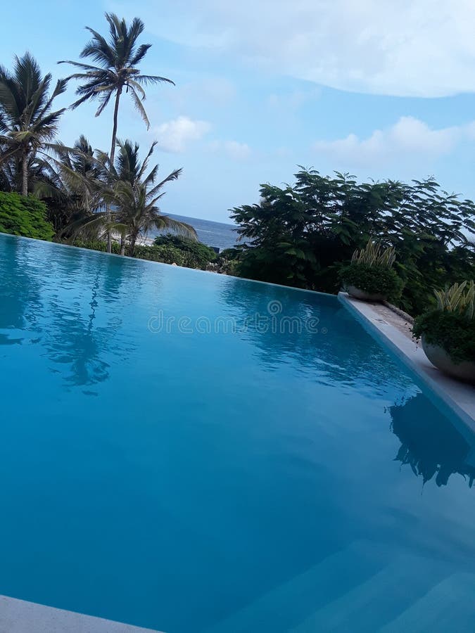 Pool stock image. Image of water, ocean, view, poolside - 104813633