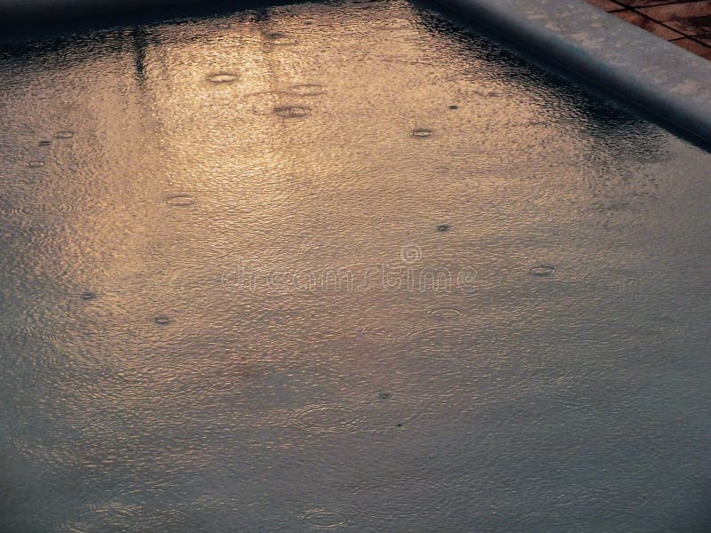 Pool in the rainy day stock photo. Image of abstract - 202226488