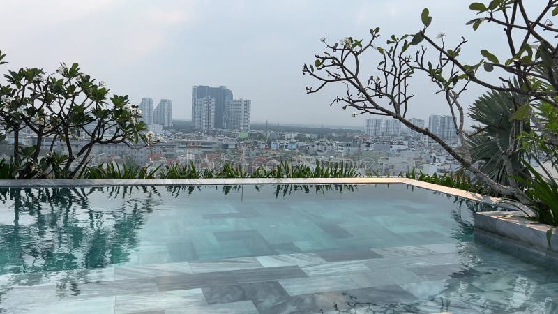 Pool on the Roof of the House Side Shot of Solar Panels on the Roof of ...