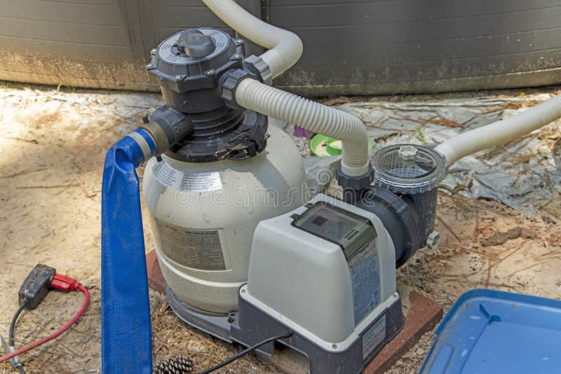 Pool sand filter and pump stock image. Image of grey - 221143217