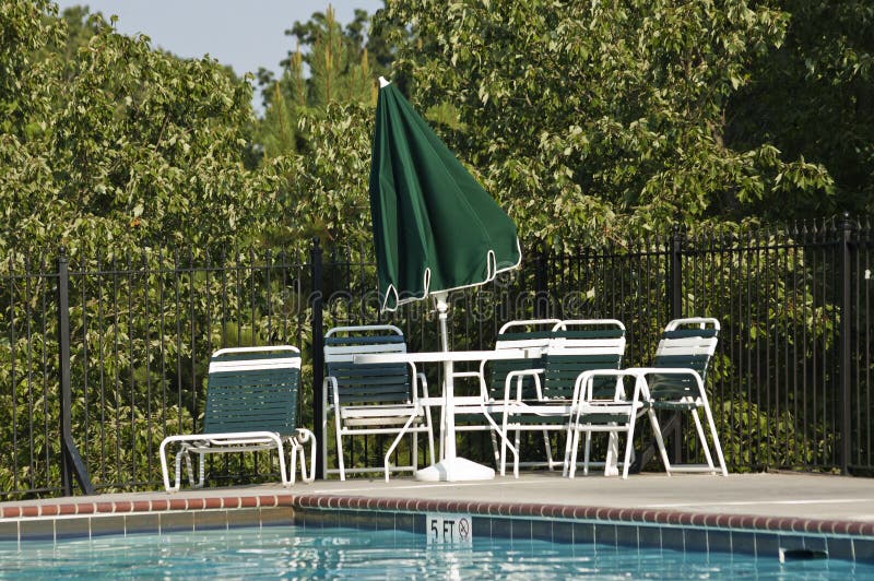 Pool Side stock photo. Image of deck, fencing, furniture - 19136196