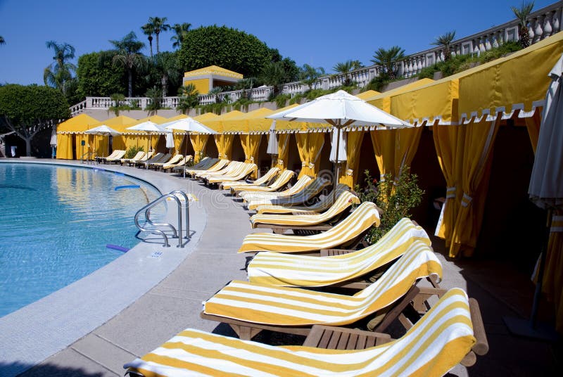 Pool Side Cabanas at Luxury Resort Stock Photo - Image of yellow, hotel ...