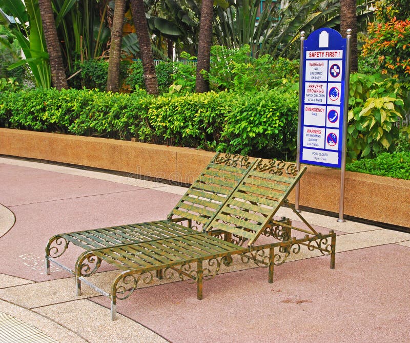 Pool Side Deckchair with Safety First Instruction Board Stock Image ...