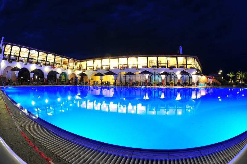Pool Side of a Sea Resort at Night Stock Photo - Image of ocean, side ...